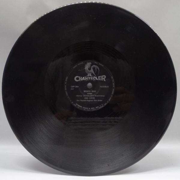 Disco 78 RPM - `Mundo Mau` e `A Outra Face`, com Ana Lú